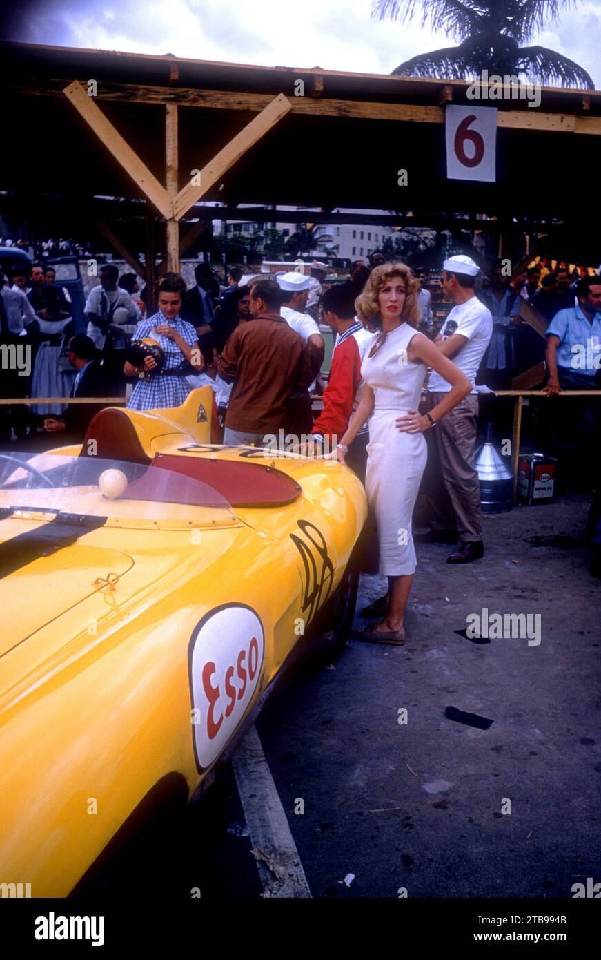 HAVANA, CUBA - FEBRUARY 24: An unidentified woman poses next to the #48 ...