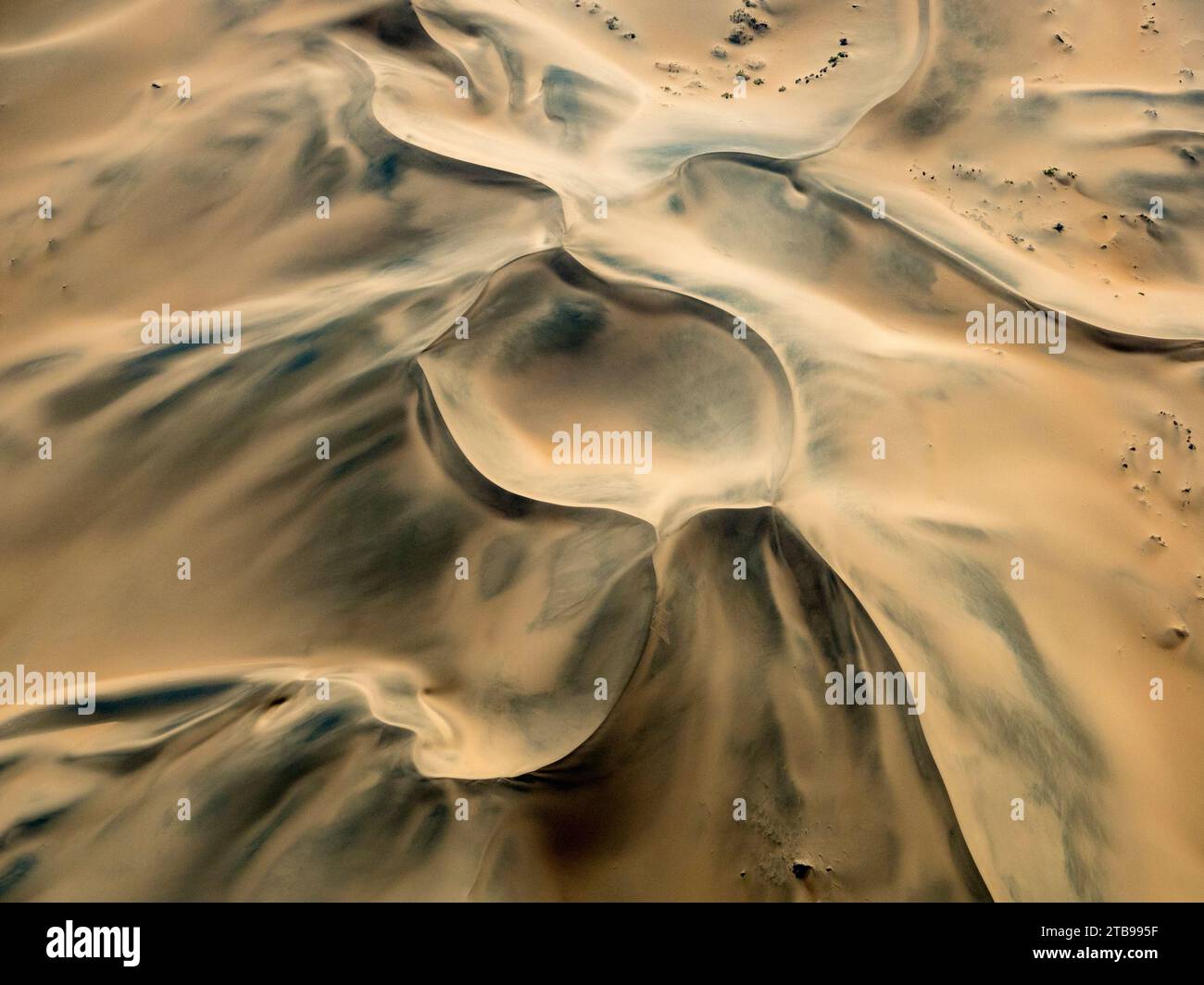 Aerial view of windswept sand dunes within Namib-Naukluft Park ...