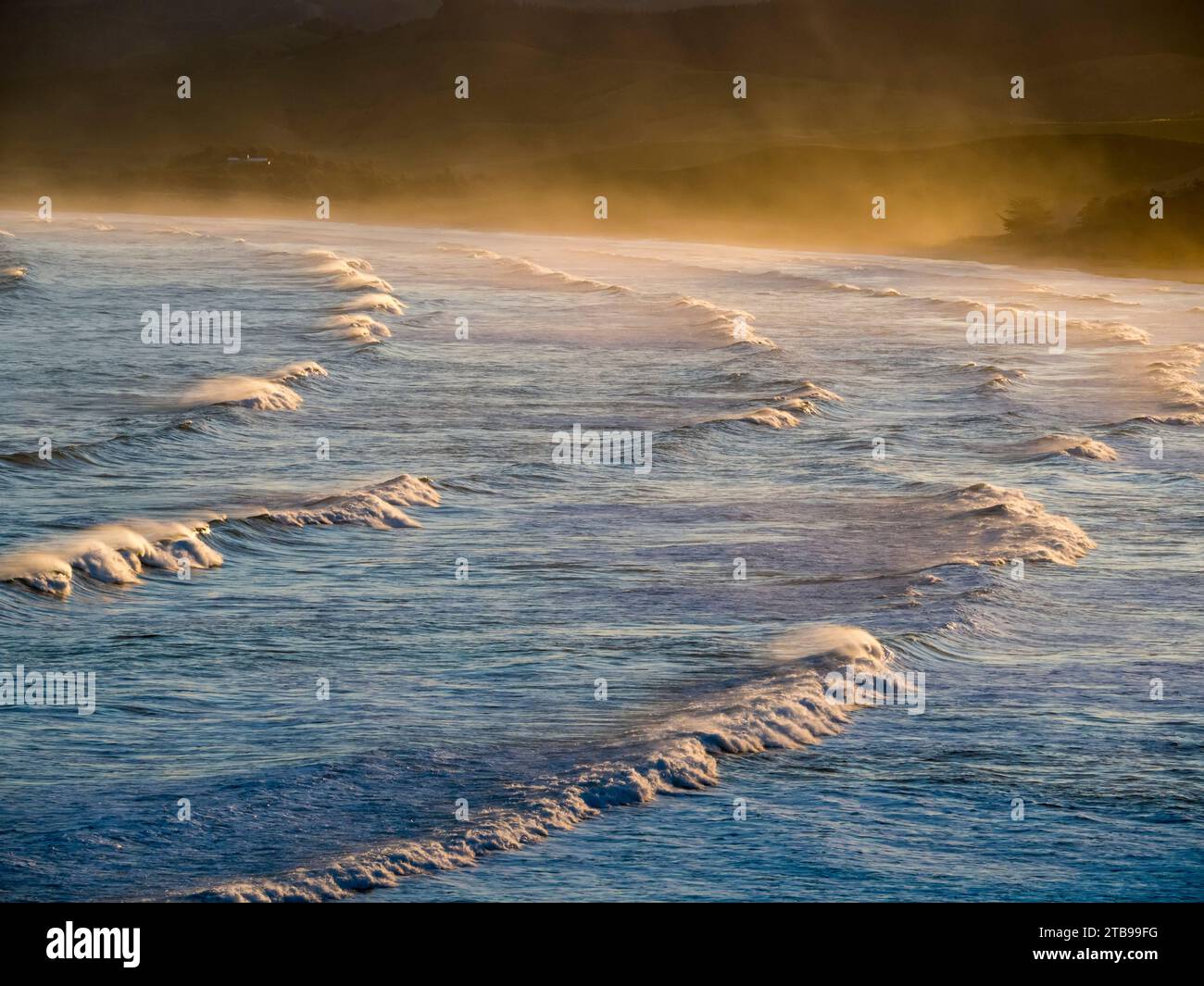 Waves of the Pacific Ocean come ashore near Katiki Point; Moeraki ...