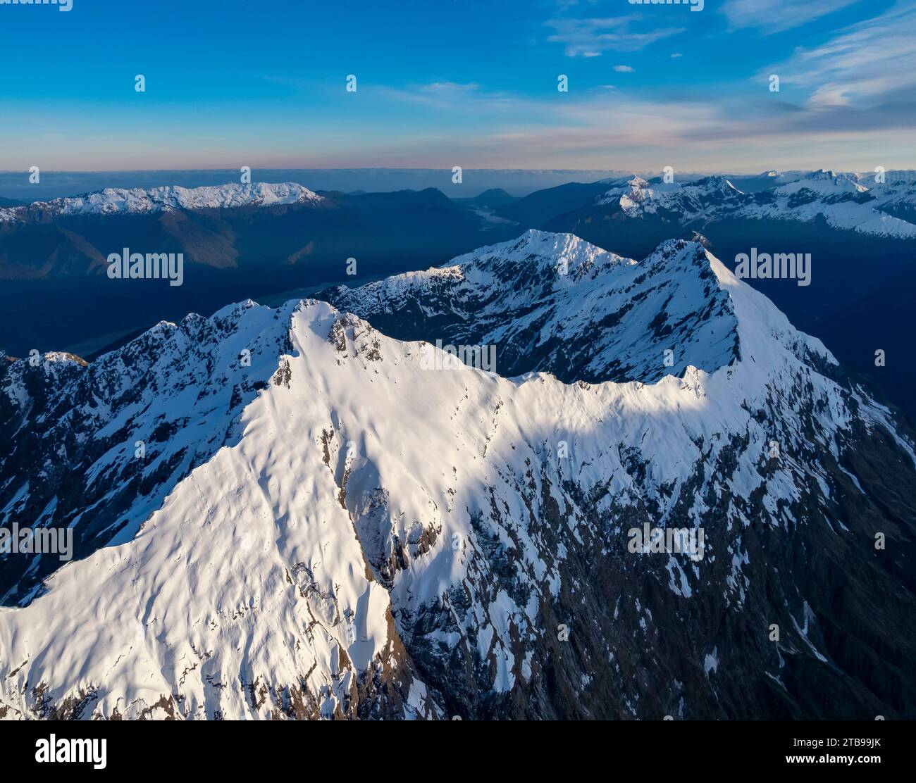 New Zealand's Southern Alps viewed from a helicopter at sunrise in ...