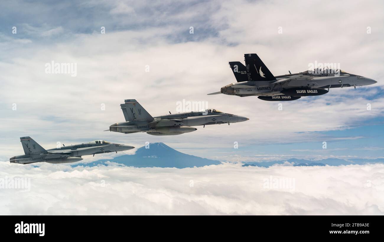 U.S. Marine Corps F/A-18 Hornet aircraft fly in formation near Mount ...