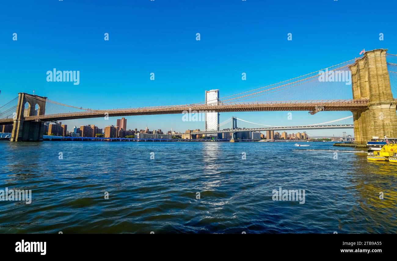 Brooklyn and Manhattan bridges with New York City's Lower Manhattan ...