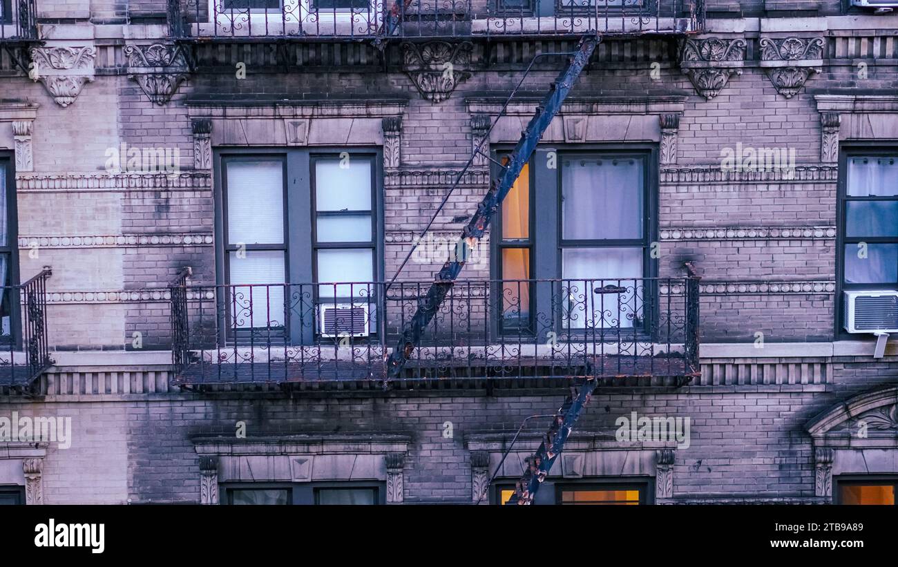 Typical New York fire escape ladders and balconies Stock Photo - Alamy