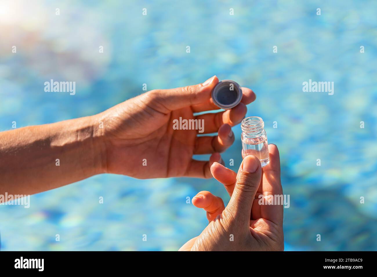 Technician test swimming pool water hi-res stock photography and images ...