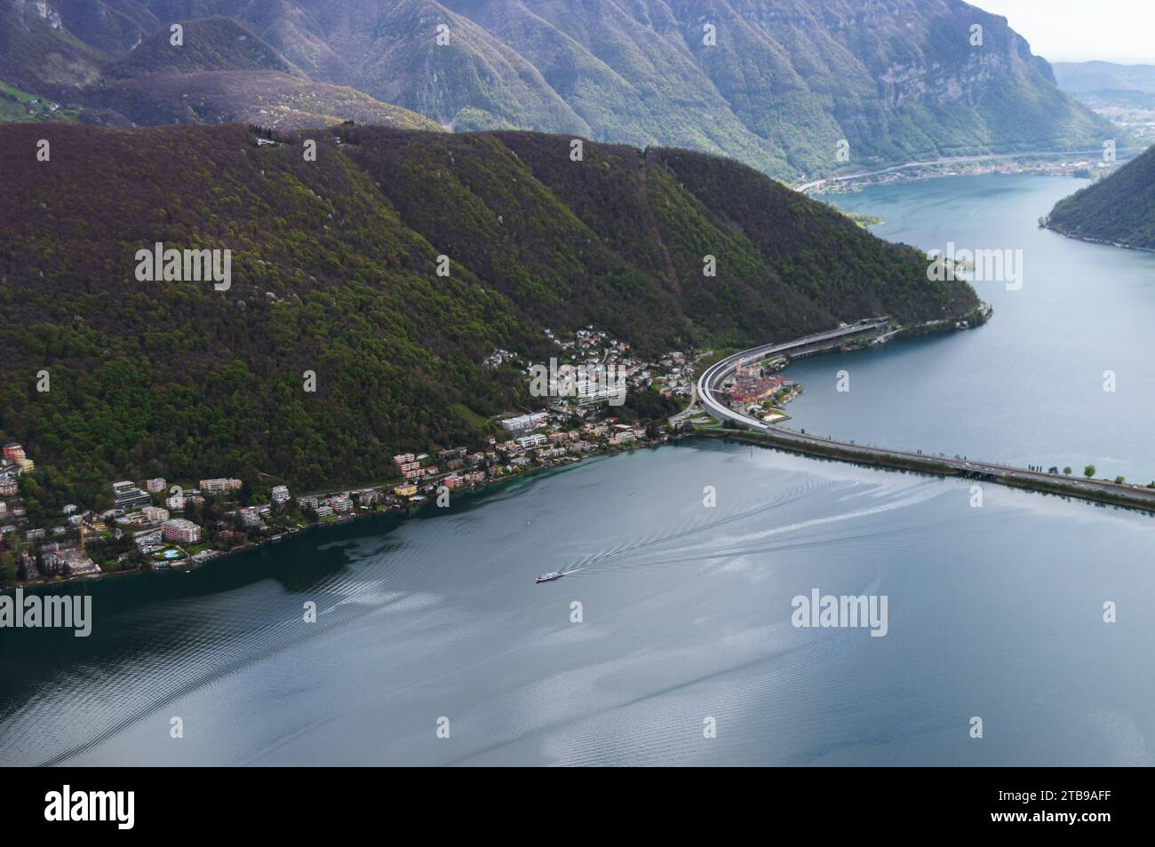 The Melide causeway crosses across Lake Lugano in the Swiss canton of ...