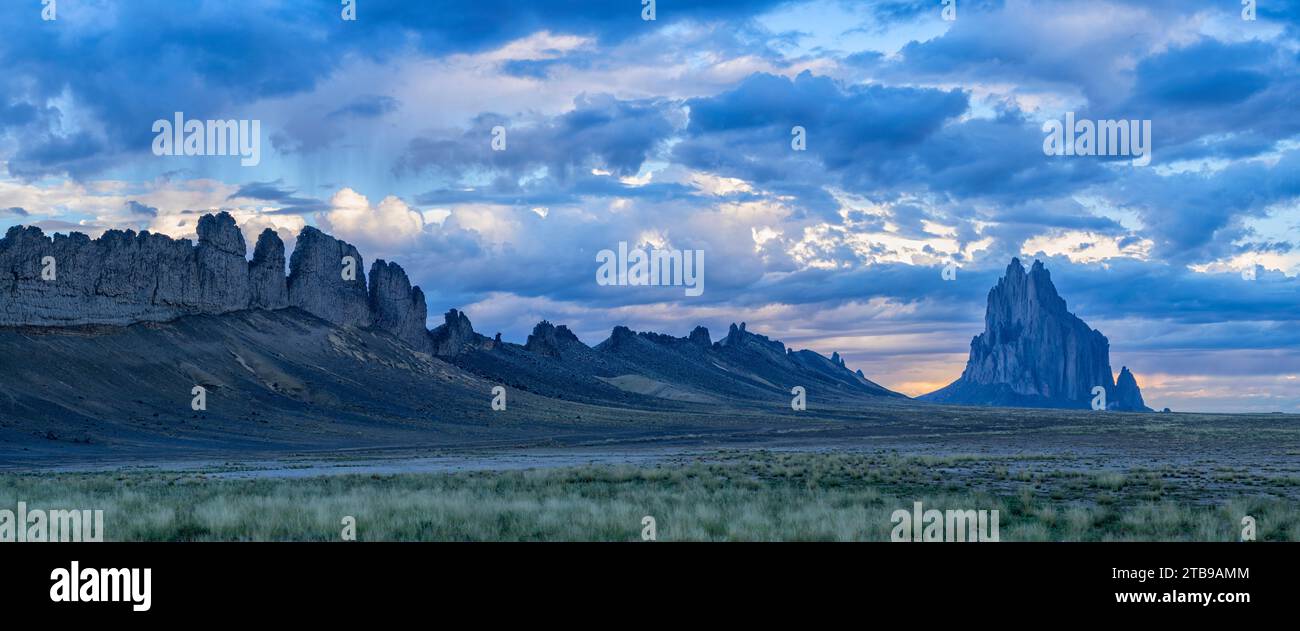 Dramatic storm clouds clear above the rocky ridge and formation of the ...