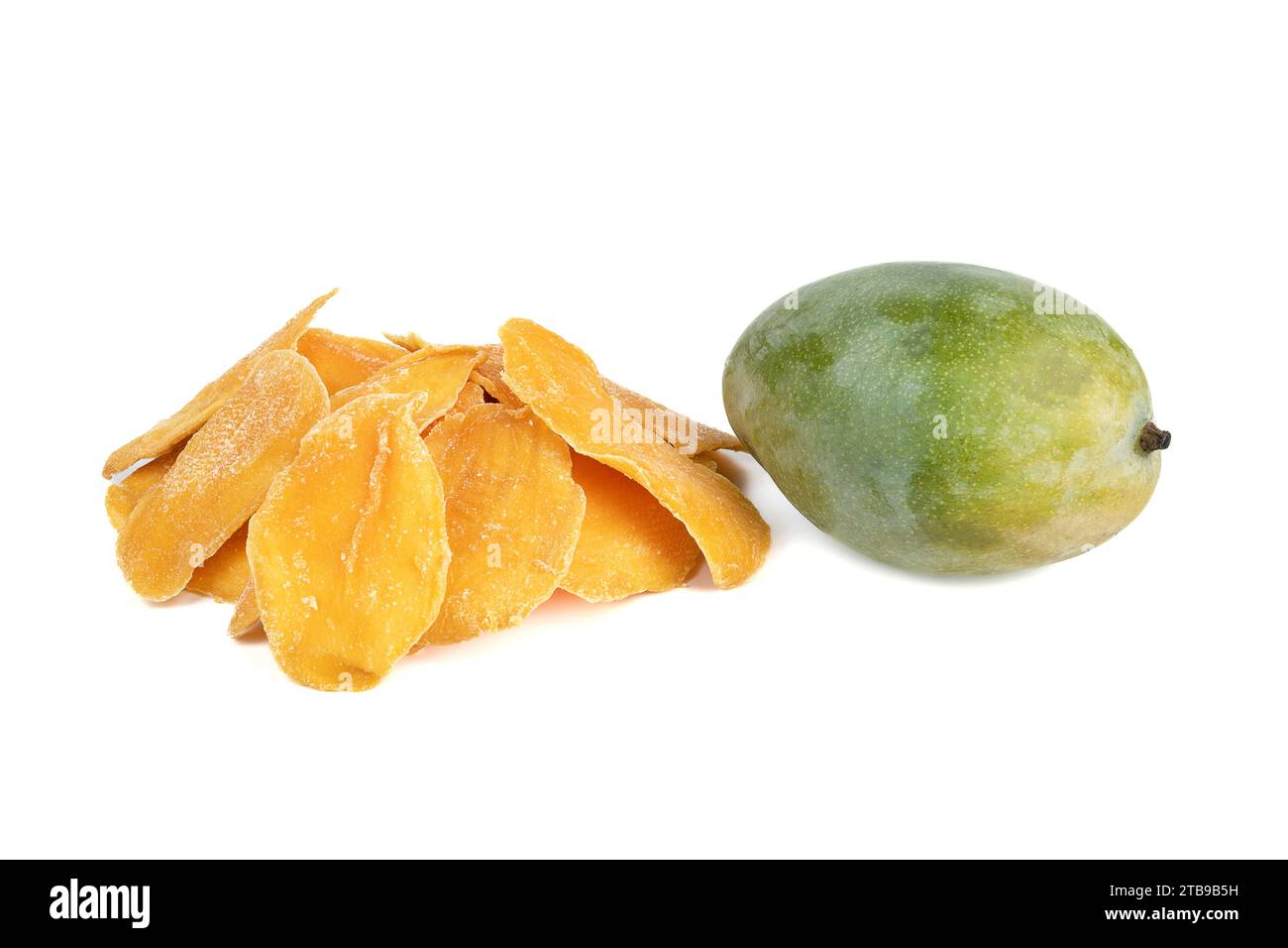 Dried mango slices and whole Egyptian mango fruit isolated on white ...