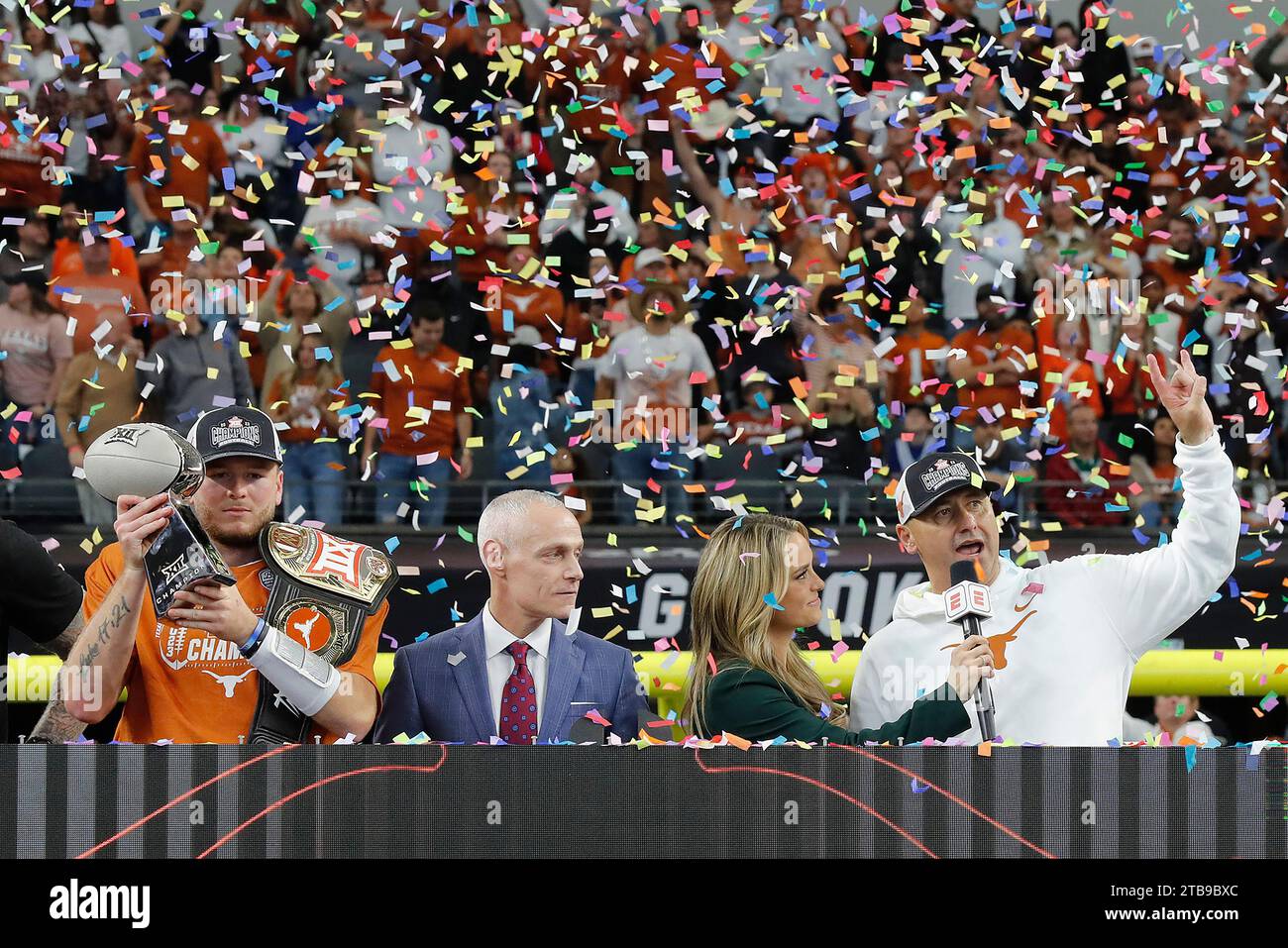 Texas quarterback Quinn Ewers (left) and Big 12 commissioner Brett ...