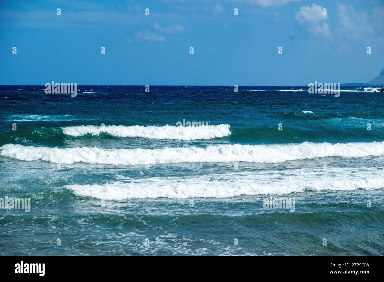 Greece, ripple dark sea water, splashing white foam, Greek blue sky ...