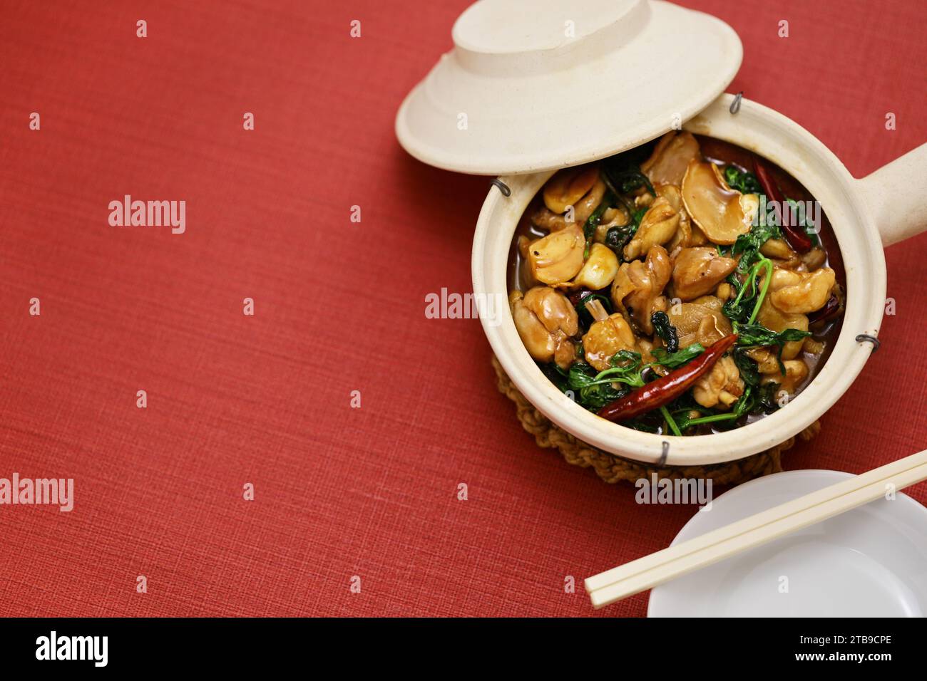 three-cup chicken ( San Bei Ji ) in a clay pot, Taiwanese traditional ...