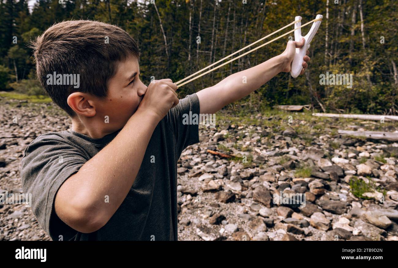 Boy sling shot hi-res stock photography and images - Alamy