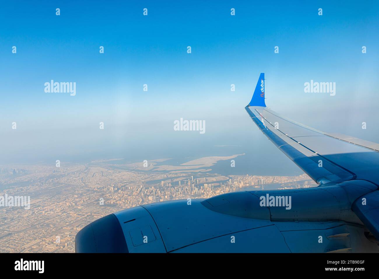 Dubai, United Arab Emirates - October 12, 2023: Plane wing with Fly ...