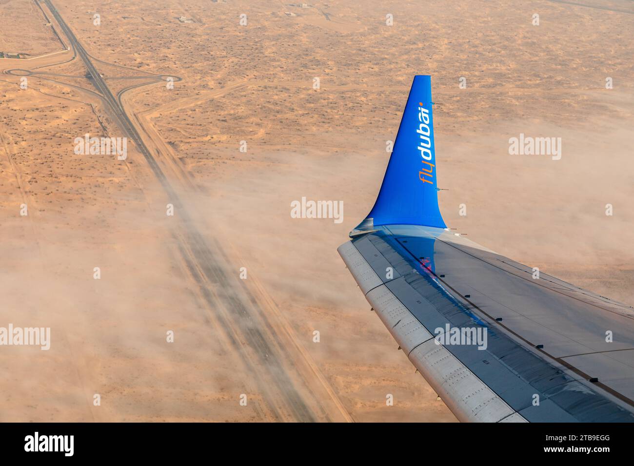 Dubai, United Arab Emirates - October 12, 2023: Plane wing with Fly ...