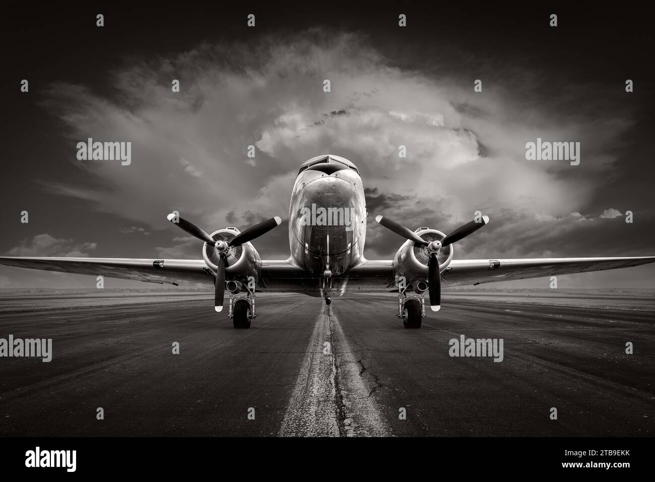 historical aircraft on a runway against a dramatic sky Stock Photo - Alamy