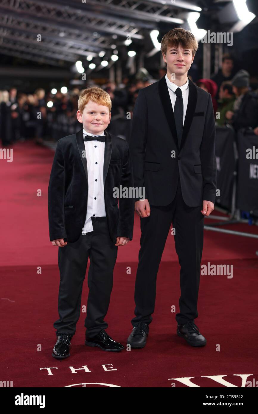 Teddy Hawley, left, and Timothee Sambor pose for photographers upon ...