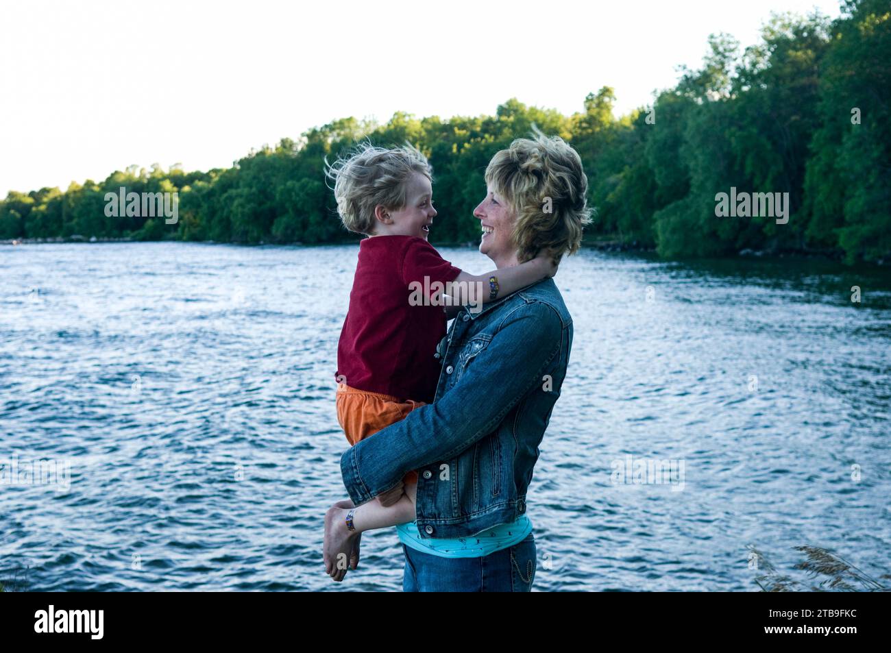 Mother and her son enjoy the view at Leech Lake in Minnesota, USA ...