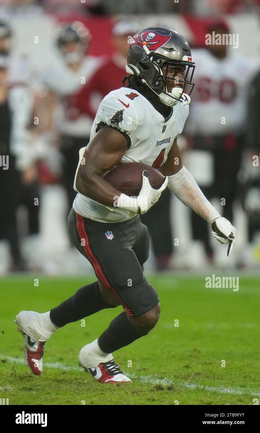 Tampa Bay Buccaneers running back Rachaad White (1) rushes against the ...