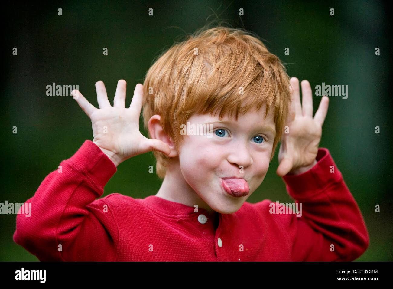 Young boy makes a goofy face; Cross Lake, Minnesota, United States of ...