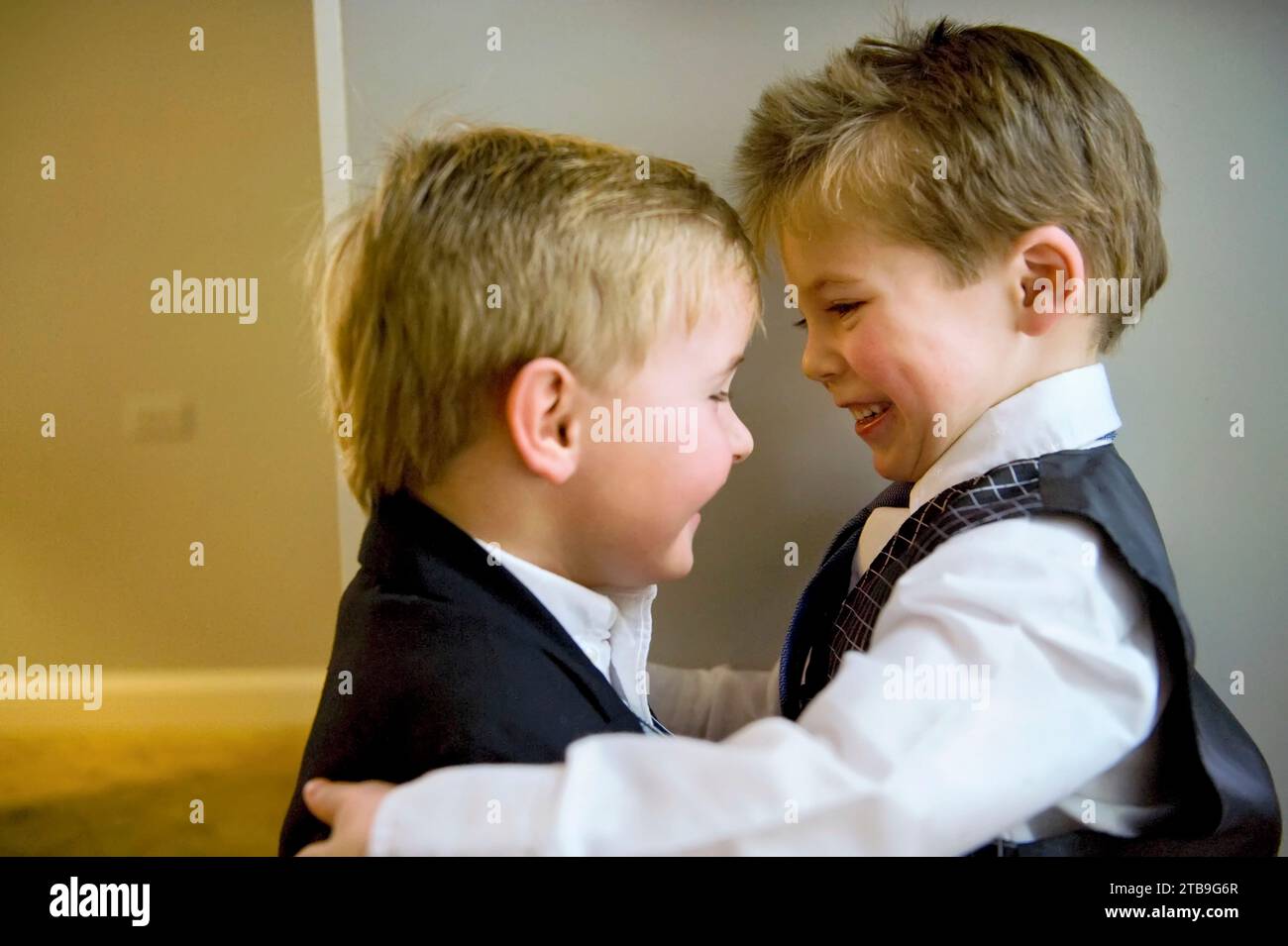 Two young brothers laughing and hugging; Lincoln, Nebraska, United ...