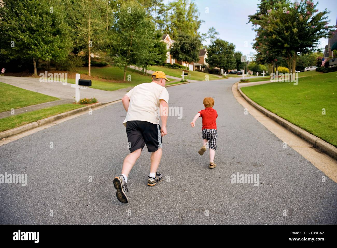 Father and son in the street hi-res stock photography and images - Alamy