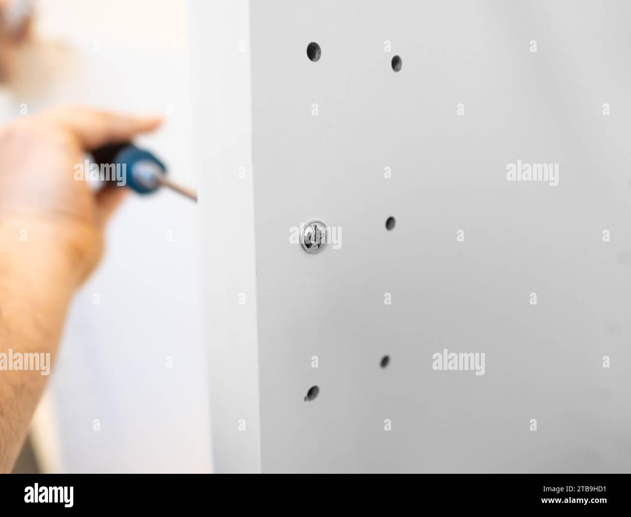 Bolt in a furniture part to connect corpus parts together. Building a ...