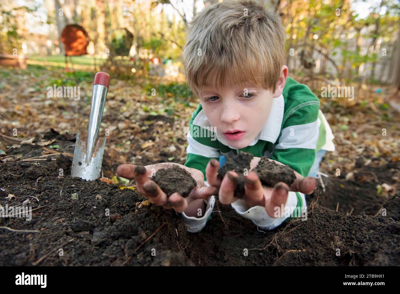 Children digging in dirt hi-res stock photography and images - Alamy