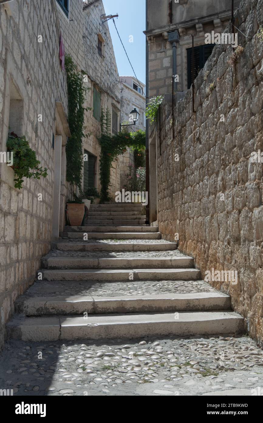 Street view of empty streets and alleyways lined with tradional stone ...