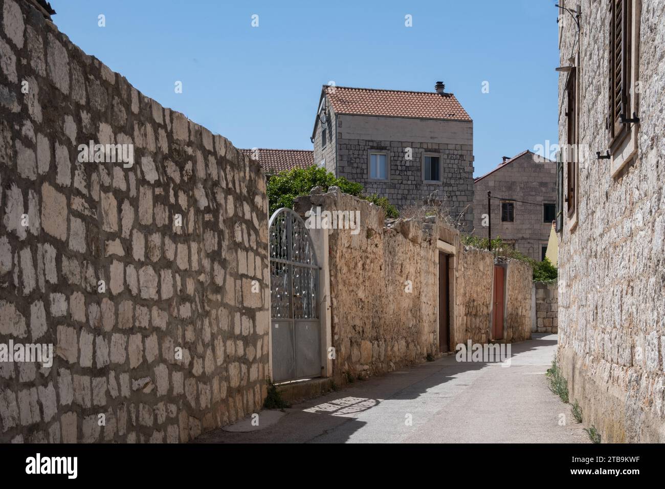 Street view of empty streets and alleyways lined with tradional stone ...