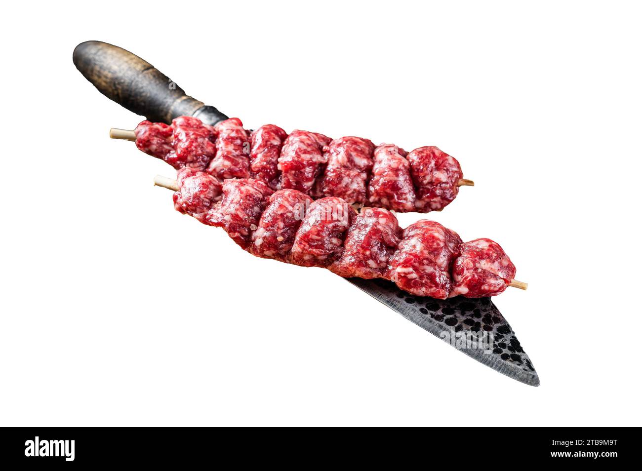 Raw kofta, kofte kebab Skewers with beef and lamb meat and spices ...