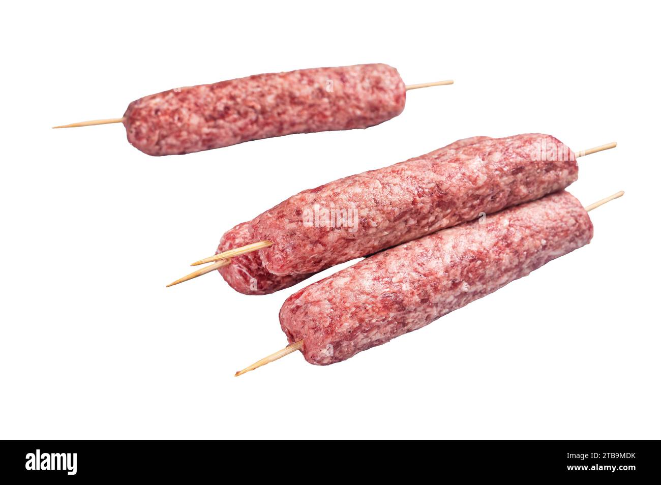 Raw kofta or lula kebabs skewers on butcher board. Isolated, white ...