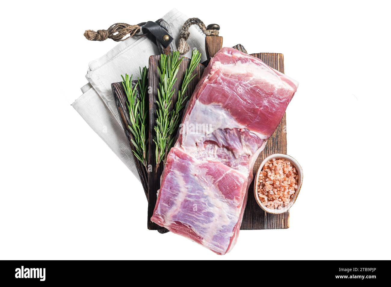 Pork belly block, raw meat with skin on a wooden board with rosemary ...