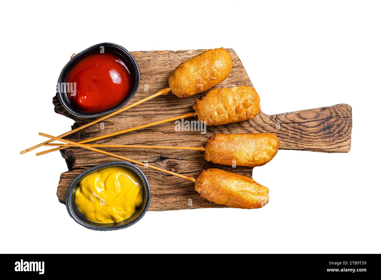 Traditional American street junk food Deep fried corn dogs with mustard ...