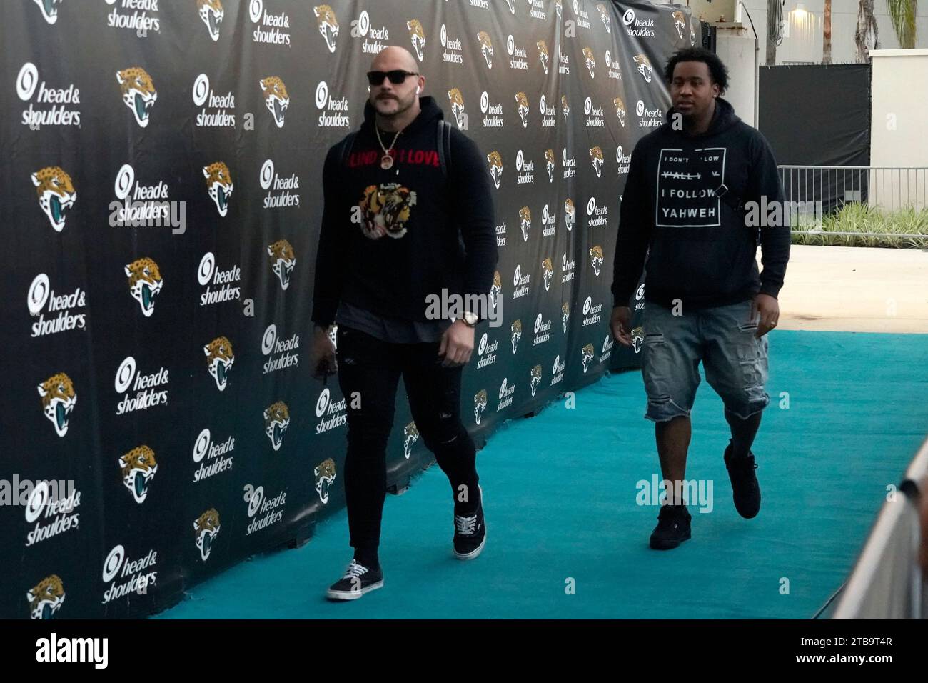 Jacksonville Jaguars defensive end Adam Gotsis, left, and Jacksonville ...