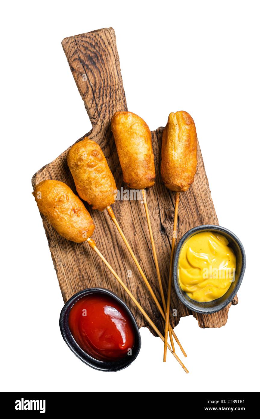 Traditional American street junk food Deep fried corn dogs with mustard ...