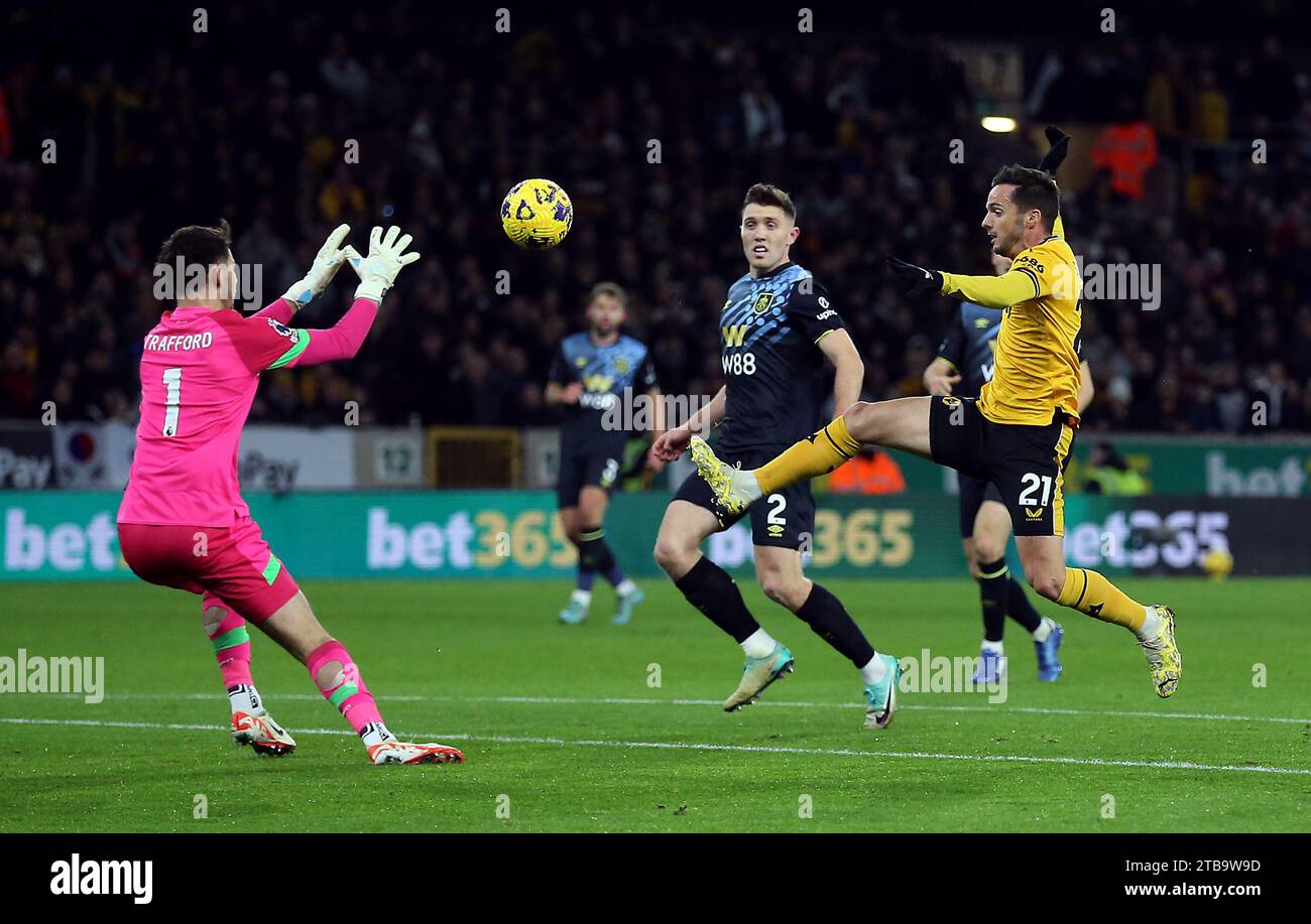 Burnley goalkeeper James Trafford claims the ball ahead of ...