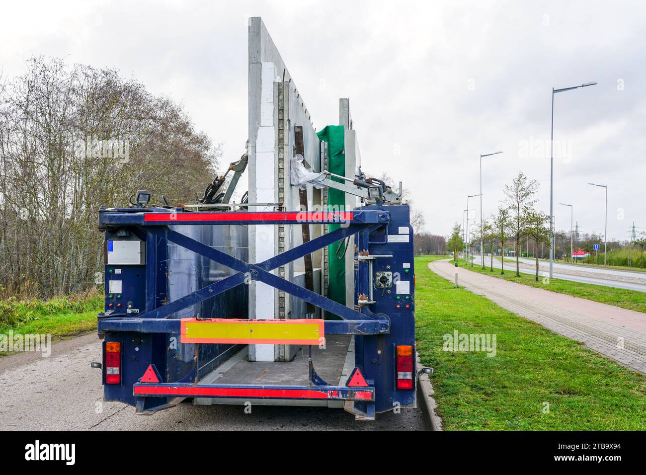 Transportation of reinforced concrete precast wall panels with a ...