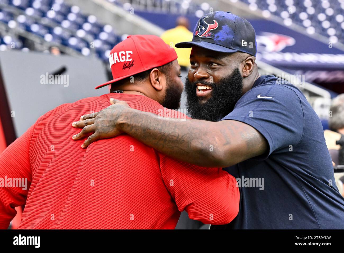 Houston Texans defensive tackle Sheldon Rankins, right, greets Antwaun ...