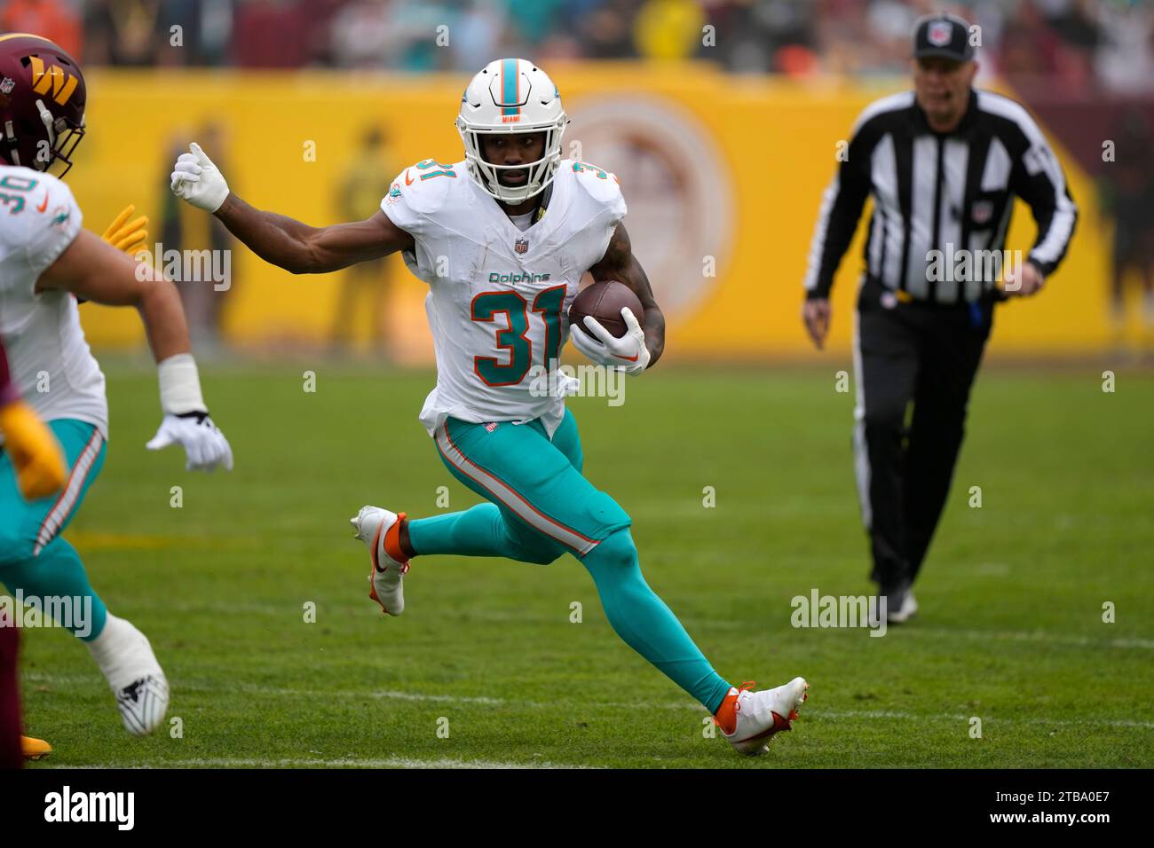 Miami Dolphins running back Raheem Mostert (31) carries the ball during an NFL football game ...