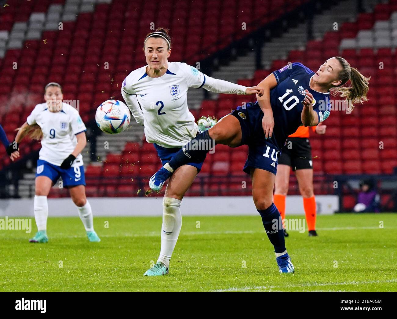 England's Lucy Bronze and Scotland's Kirsty Hanson battle for the ball ...