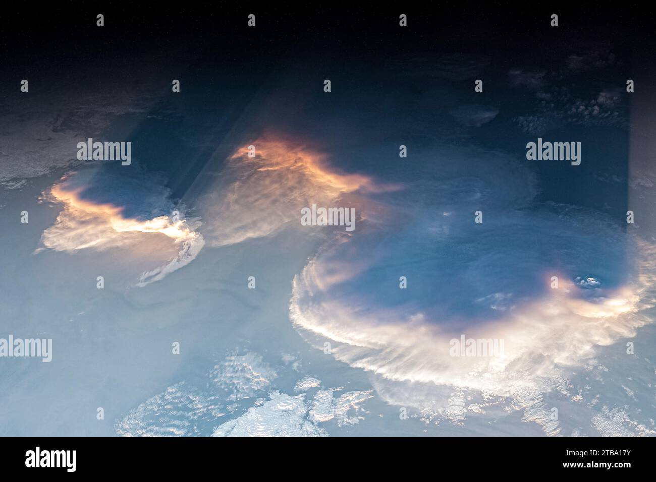 View from space of anvil cumulus clouds, crepuscular rays and Rayleigh ...