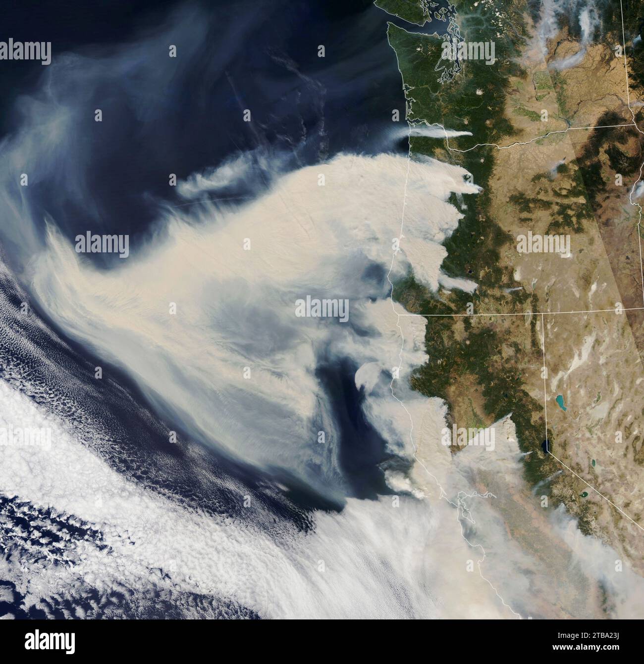 Natural-color satellite image of thick smoke plumes from wildfires on ...