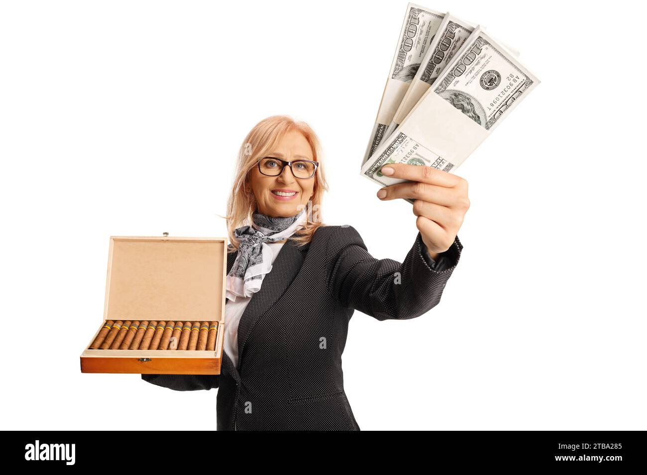 Woman holding a wooden box of cigars and stacks of money isolated on ...