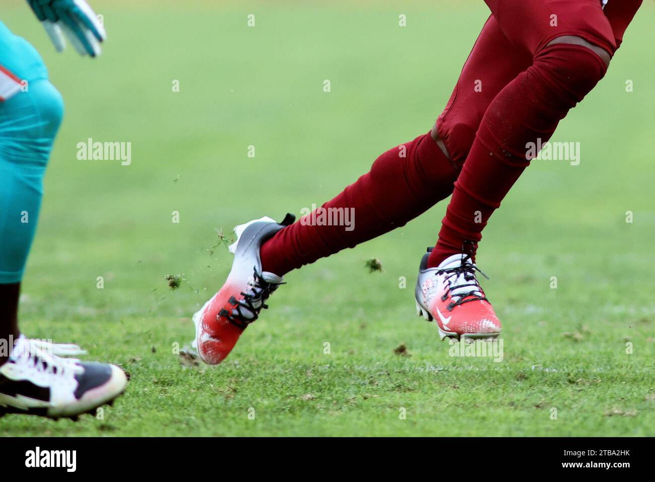 Washington Commanders safety Kamren Curl (31) runs wearing MCMC cleats ...