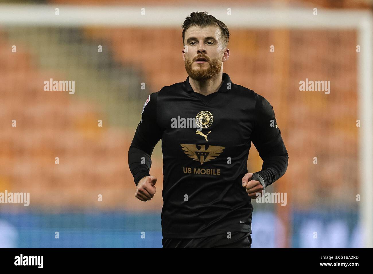 Nicky Cadden #7 of Barnsley leaves the field of play after a ...