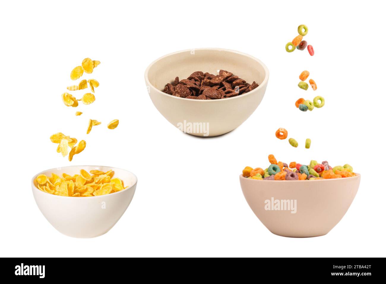 Colorful cereal box for morning breakfast. Corn flakes falling to the ...