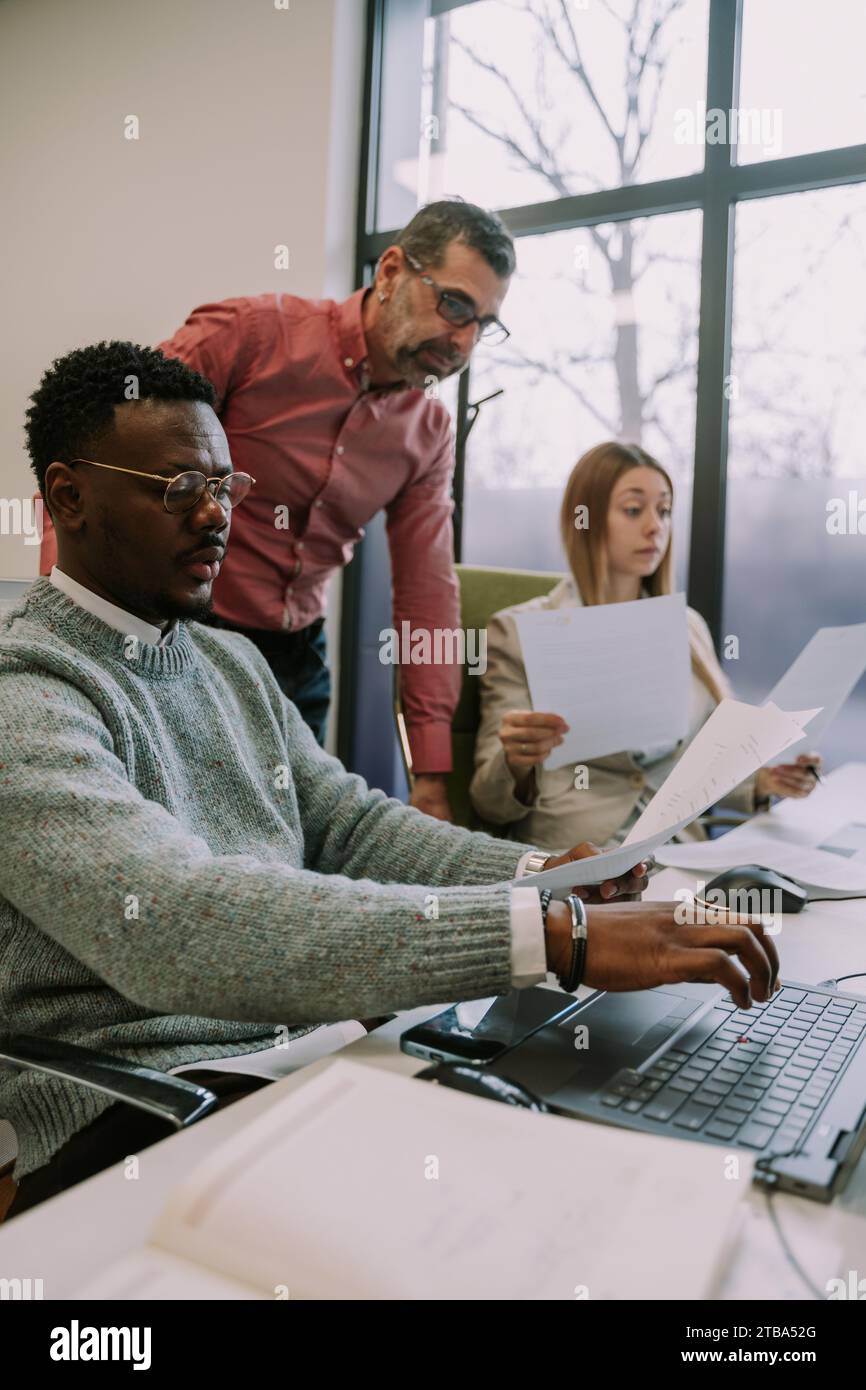Office employees working Stock Photo - Alamy