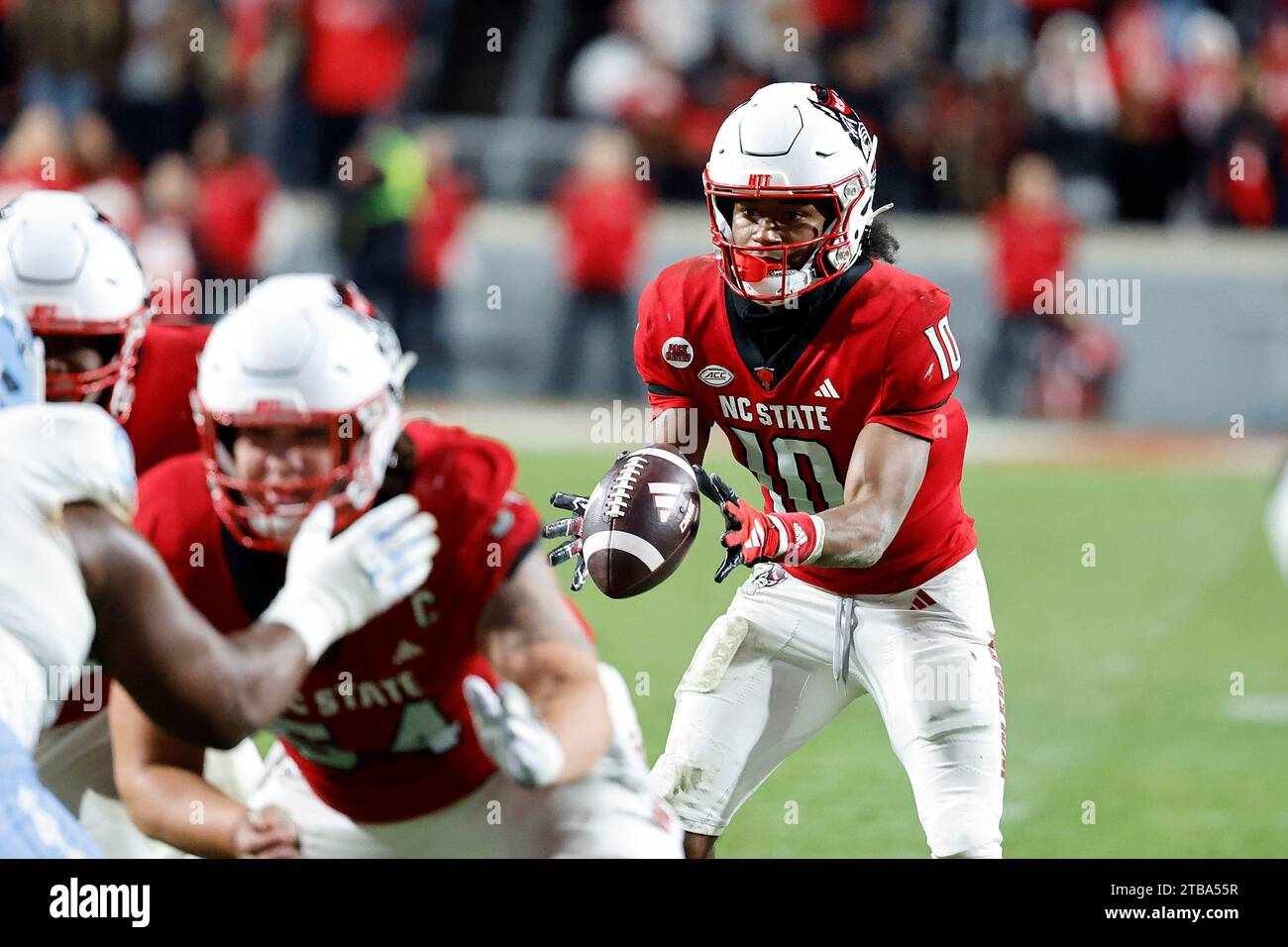 North Carolina State wide receiver Kevin Concepcion (10) takes the snap ...
