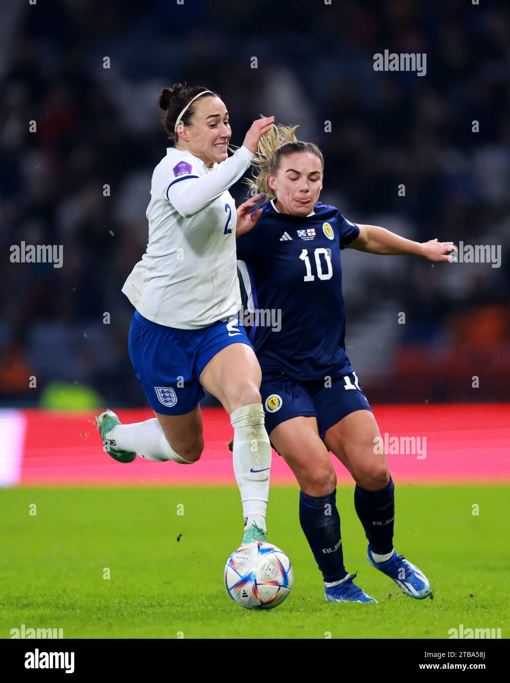 Scotland's Kirsty Hanson (right) and England's Lucy Bronze battle for ...