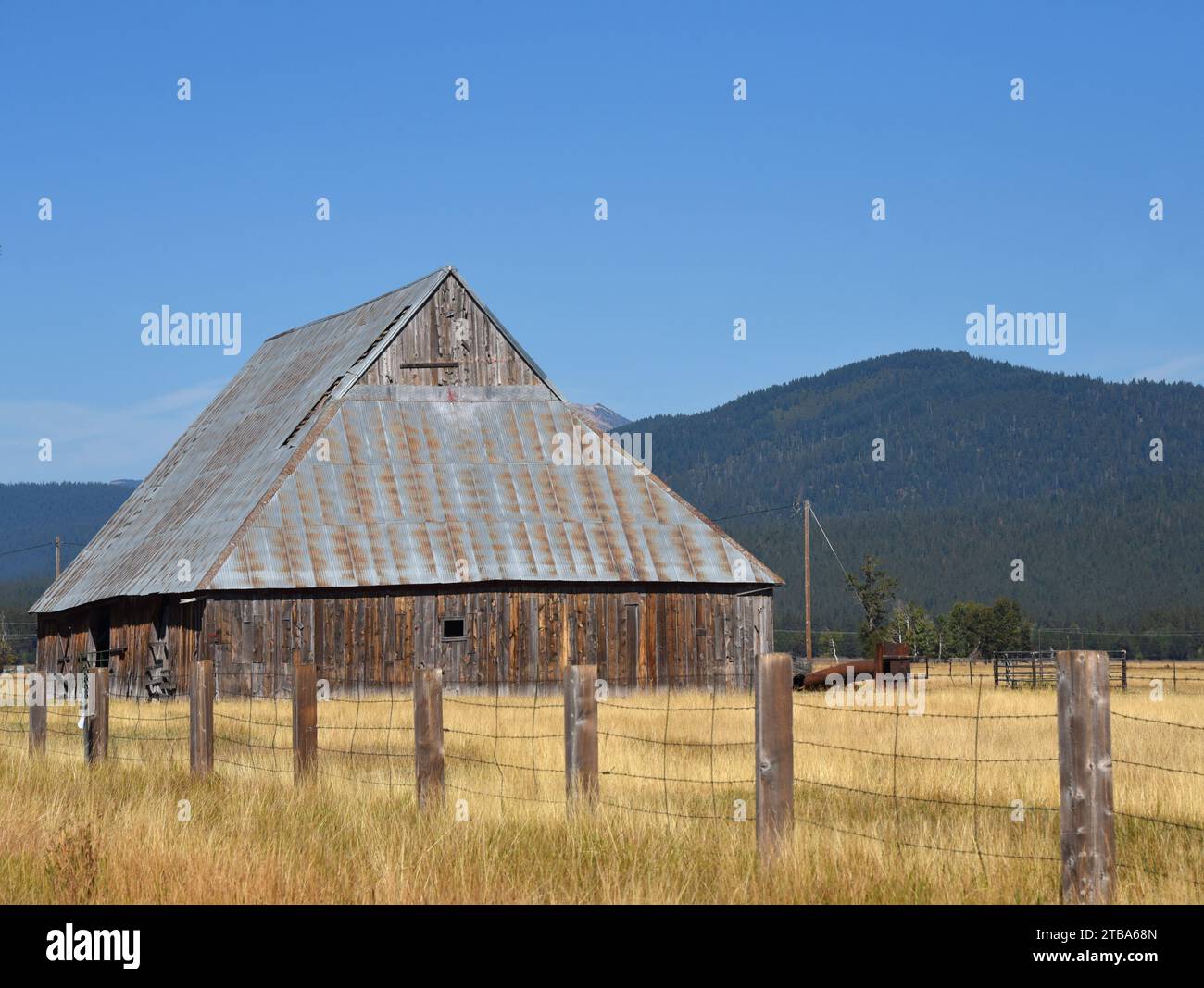 Rustic, wooden barn, in Oregon, is constructed of rough sided planks ...