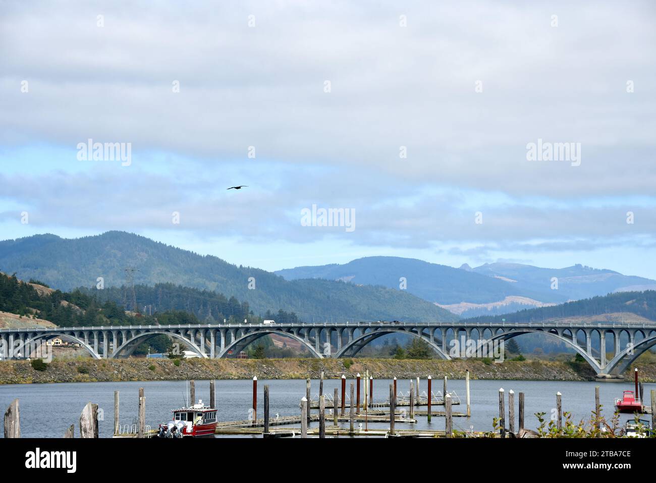 Patterson Bridge spans the Rogue River at Gold Beach, Oregon. Famous ...